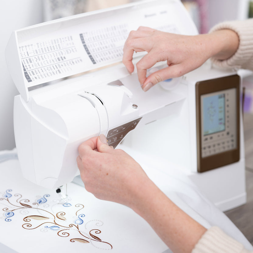 Husqvarna® Viking® DESIGNER TOPAZ™ 50 Sewing & Embroidery Machine ...
